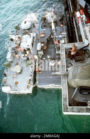 PB Mark III patrol boats from Special Boat Units 11 and 20 moor ...