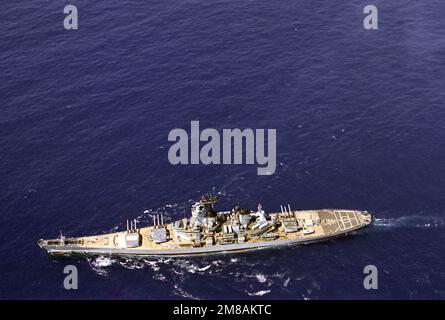 An overhead view of the battleship USS IOWA (BB-61) underway as part of ...