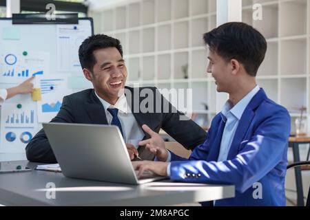 Business team of financial analyze about company's graph profit ...