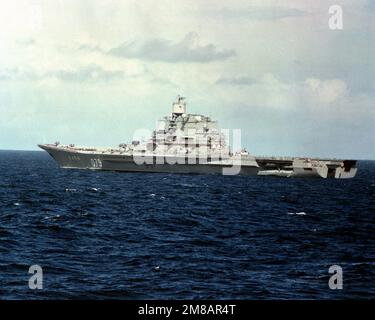 Port beam view of the Soviet Kiev class carrier MINSK (CVHG) underway ...