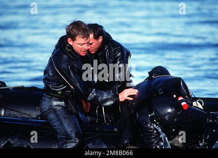 An Army Special Forces Zodiac raft is loaded into an MH-53J Pave Low ...