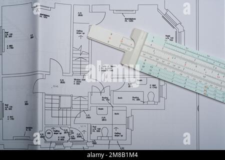 Architects drawings with a slide ruler. An old fashioned way to make ...