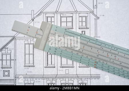 Architects drawings with a slide ruler. An old fashioned way to make ...