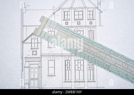 Architects drawings with a slide ruler. An old fashioned way to make ...
