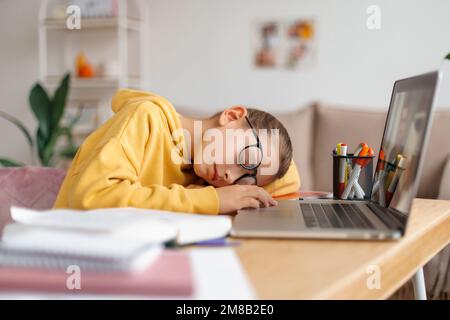 The girl fell asleep on a laptop while working. Sleep during working ...