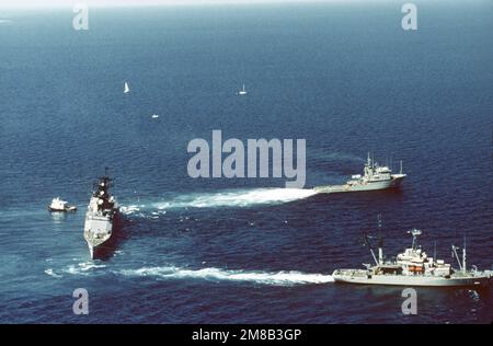 USNS Mohawk and USS Grasp pull USS Spruance off a coral reef in the ...