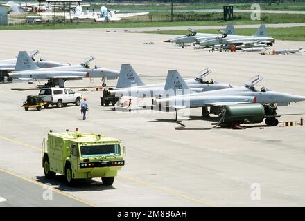 Honduran F-5E Tiger II aircraft are serviced on the flight line as a ...