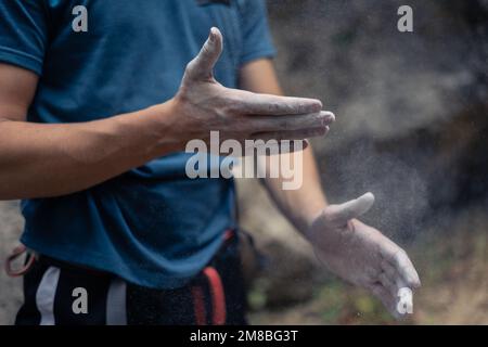 A closeup of the rock climber's hands covered in climbing chalk Stock ...
