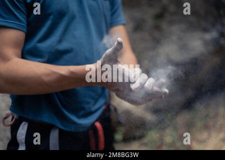 A closeup of the rock climber's hands covered in climbing chalk Stock ...
