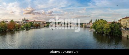 Panoramic view of Prague Castle and Charles Bridge on sunny spring morning, Praha, Czech ...