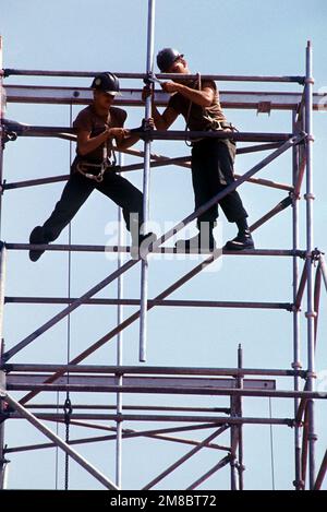 Seabees of Construction Battalion Unit 402 (CBU 402) prepare ground for ...