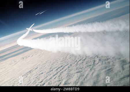 Two MiG-29 aircraft are intercepted by F-15 Eagle fighter jets of the ...