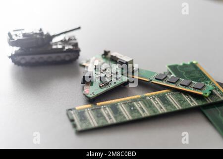 computer chips and a toy tank Stock Photo - Alamy