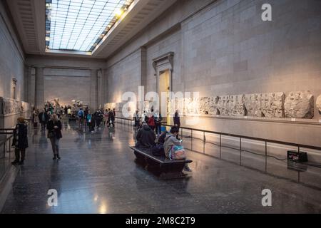 Visitors view the Parthenon Marbles, also known as the Elgin Marbles ...
