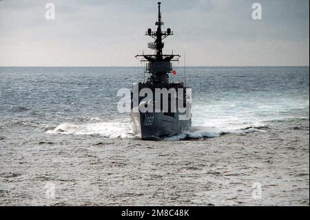 The frigate USS LANG (FF 1060) is replenished underway by the ...