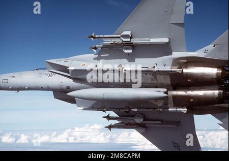 A 33rd Tactical Fighter Wing F-15C Eagle aircraft banks into a turn ...