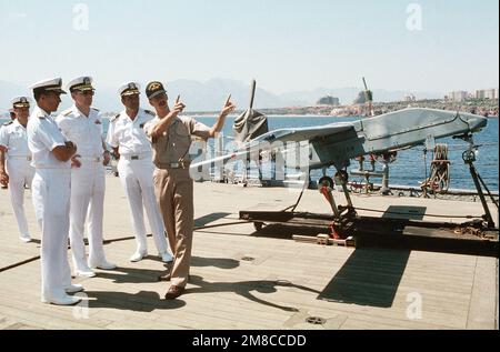 An officer discusses the Pioneer Remotely Piloted Vehicle (RPV) with ...