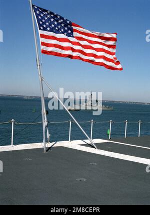 The large harbor tug Anoka (YTB-810) assist the guided missile cruiser ...