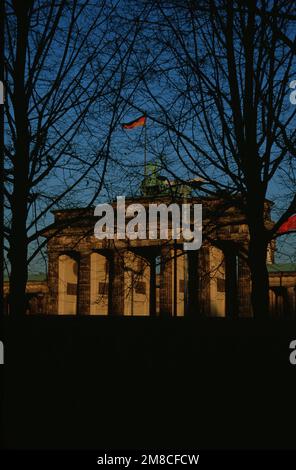 The East German flag flies atop the Brandenburg Gate. Base: Berlin ...