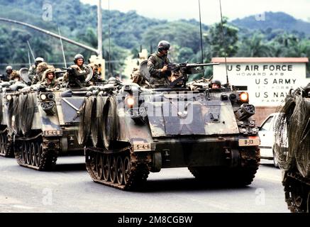 A column of M113 armored personnel carriers from 4th Battalion, 6th ...