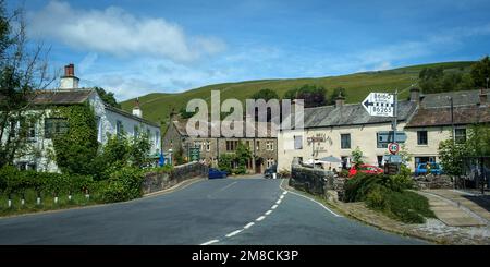 9th July 2022 - Kettlewell, UK: People in the River Wharfe during the ...