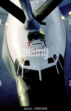 A partial view from a KC-135R Stratotanker aircraft boom operator's station of an RC-135 ...