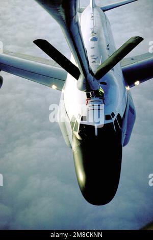 A partial view from a KC-135R Stratotanker aircraft boom operator's station of an RC-135 ...