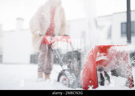 Snow thrower machine in work Stock Photo - Alamy