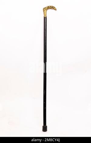 A vertical shot of a black walking cane isolated on white background ...