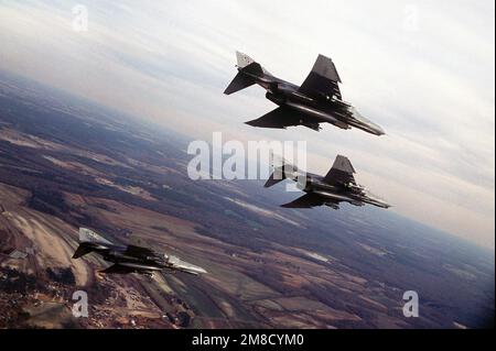 An F-4E Phantom II aircraft, foreground, and other Phantom aircraft of ...