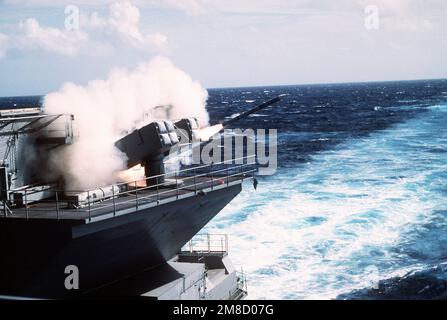 A trainer missile is launched from a Mark 29 NATO Sea Sparrow launcher ...