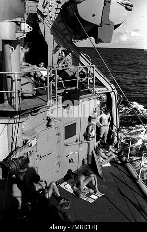 Off-duty sailors relax in the enlisted men's mess aboard the Canadian ...