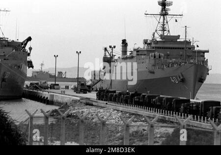 The dock landing ships USS ALAMO (LSD 33), left, and USS FORT FISHER ...