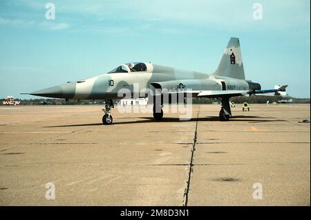 A Fighter Squadron 43 (VF-43) F-5E Tiger II aircraft rolls along a ...
