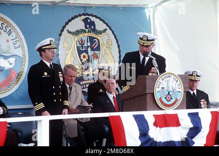 Commander Carl R. Anderson, Commanding Officer, salutes Vice Admiral ...