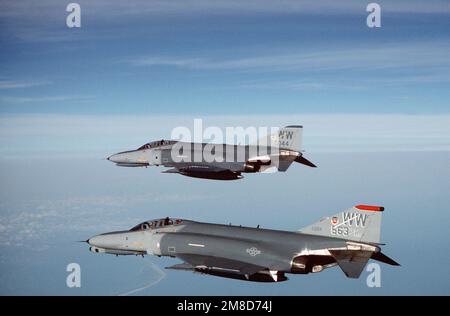 An F-4E Phantom II aircraft, foreground, and other Phantom aircraft of ...
