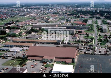 An aerial view of a portion of the base and the surrounding city of ...