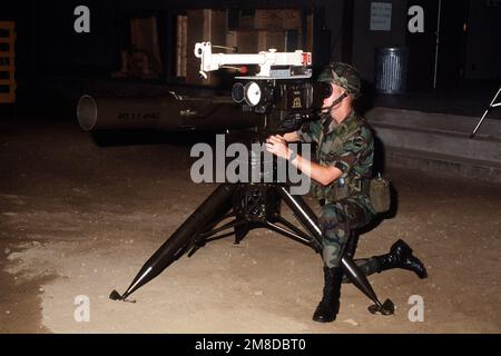 ANTI-TANK GUNNERS IN TRAINING - Mounting the anti-tank gun for action ...