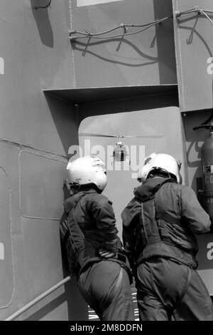 A Training Wing 5 (TAW-5) TH-57 Sea Ranger helicopter hovers over the ...