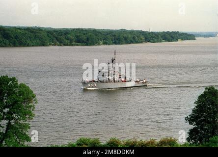 A port view of the ocean minesweeper USS IMPERVIOUS (MSO 449) as the ...