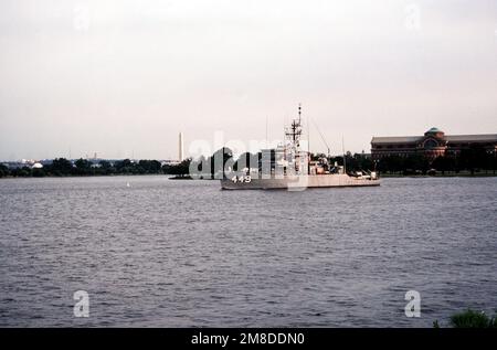 A port bow view of the ocean minesweeper USS LEADER (MSO 490) docked at ...