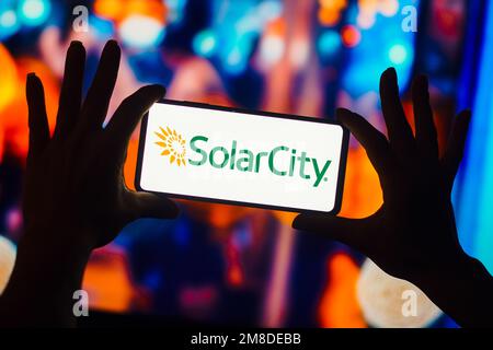 In this photo illustration, the SolarCity Corporation logo is displayed ...
