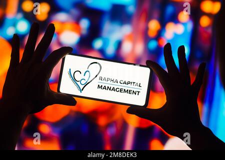 In this photo illustration, the Rapha Capital Management logo is ...
