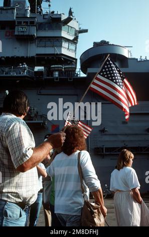 Friends and family members of crewmen aboard the guided missile cruiser ...