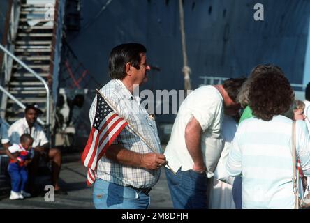 Friends and family members of crewmen aboard the guided missile cruiser ...