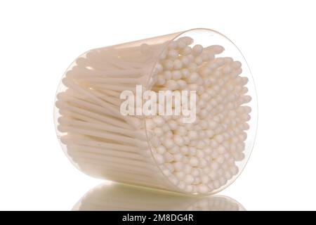 One plastic package of ear buds, macro, isolated on white background ...