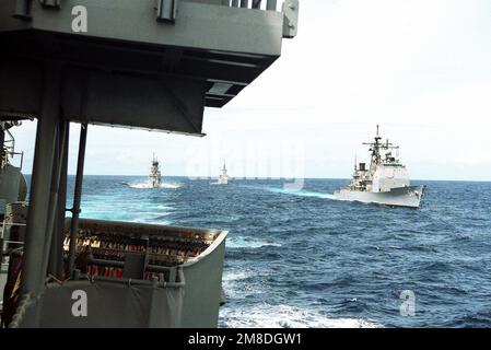 Underway north of Diego Garcia are the frigates USS REASONER (FF-1063 ...