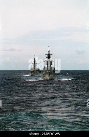 Underway north of Diego Garcia are the frigates USS BREWTON (FF-1086 ...