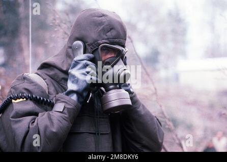 A West German soldier wearing a nuclear-biological-chemical (NBC ...