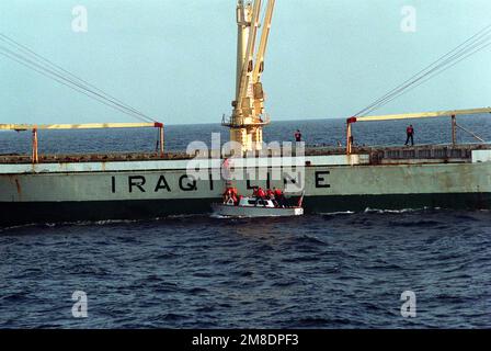 Members of a boarding team from the guided missile destroyer USS ...